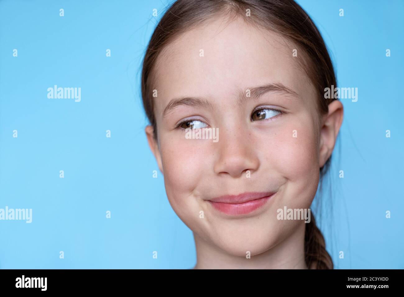 Close-up portrait of a mocking girl on a white background Stock Photo ...