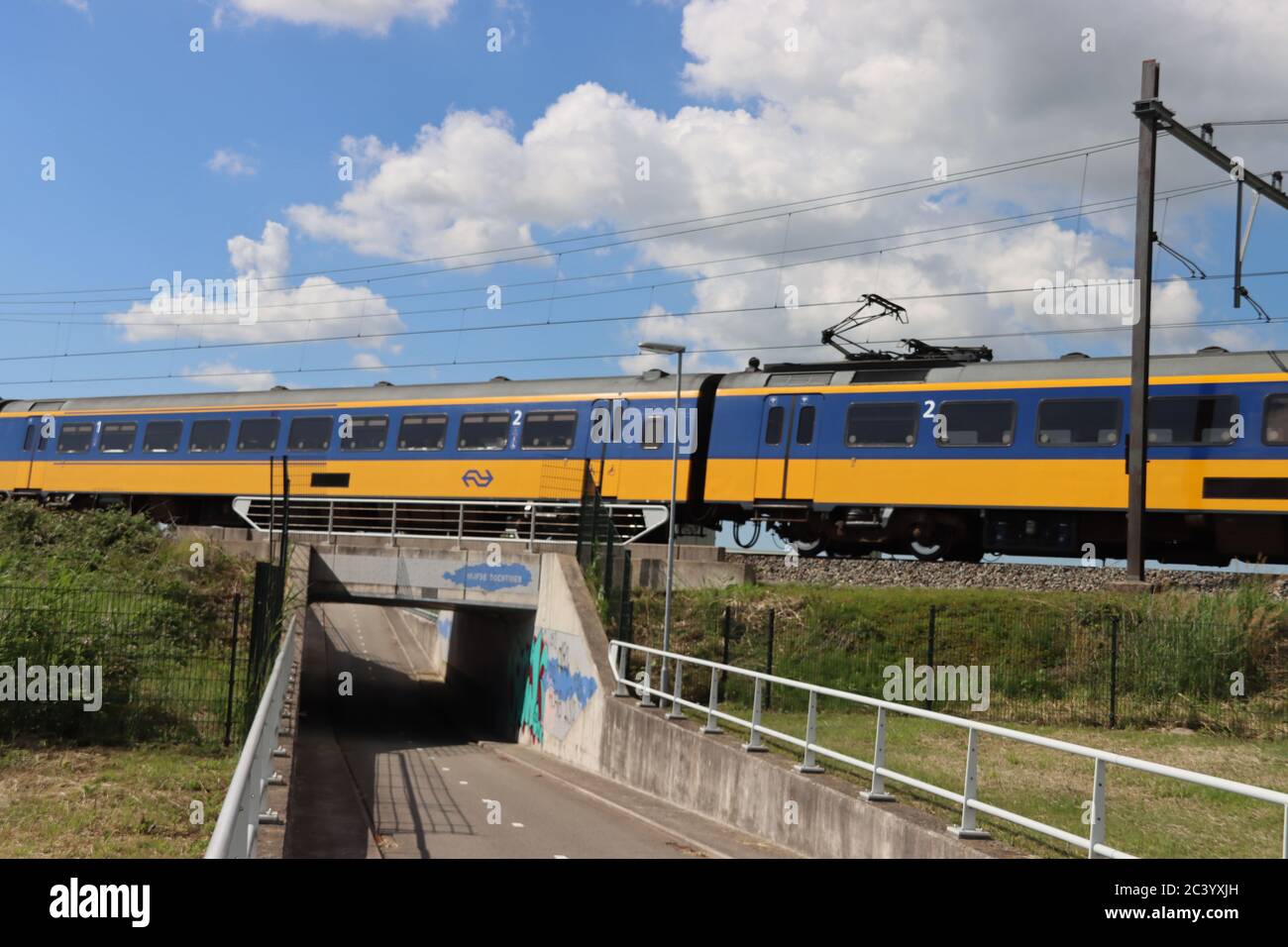 Koploper intercity train of NS at a tunnel in Moordrecht the ...