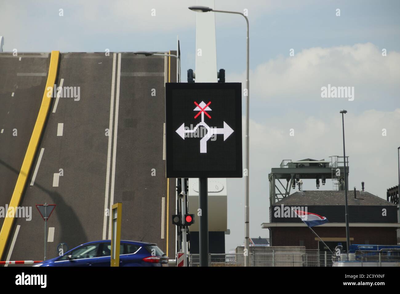Modern traffic sign with LED lighting indicates the route to the ...