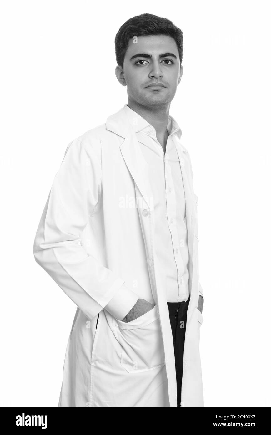 Portrait of young handsome Persian man doctor Stock Photo - Alamy