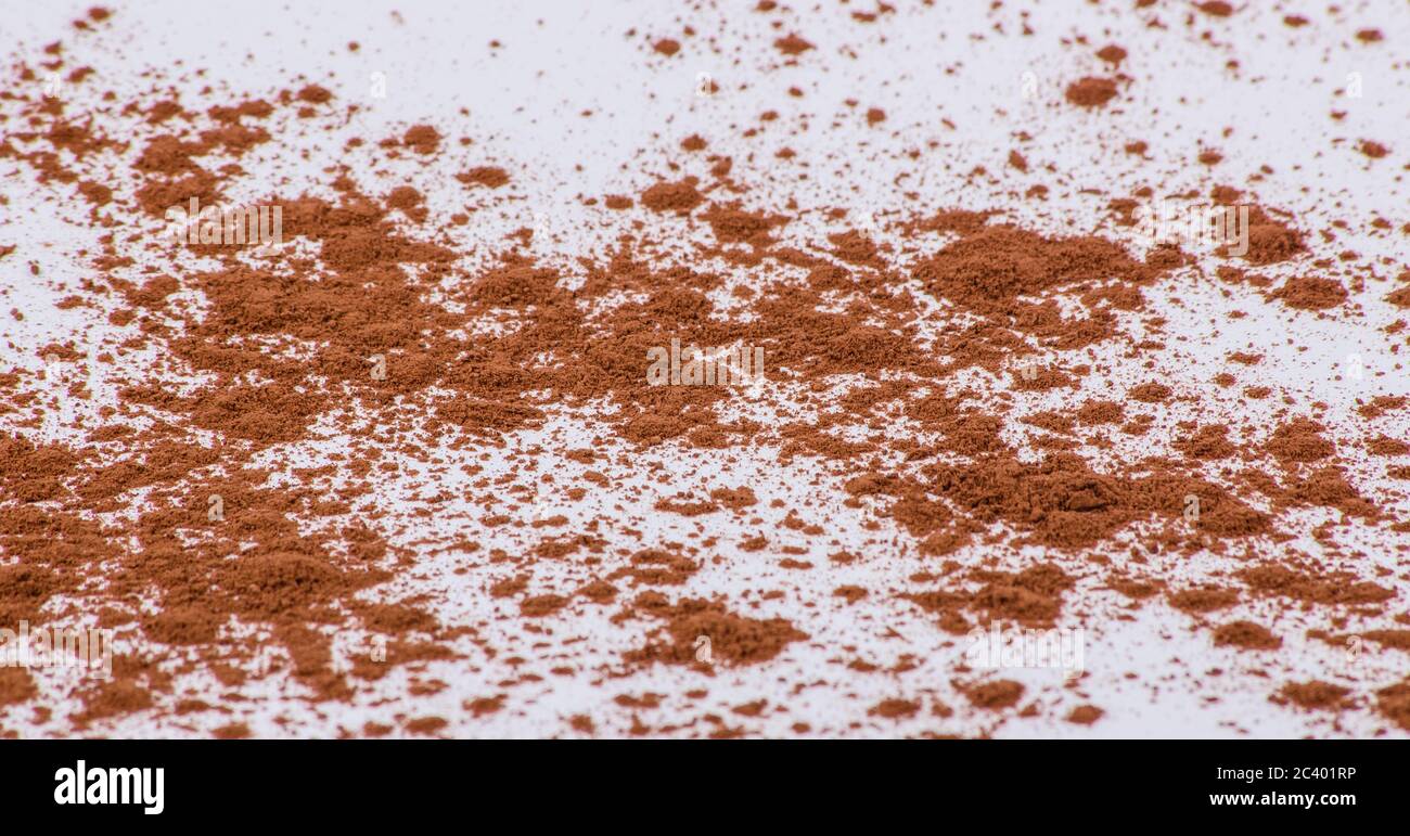 Chocolate Powder isolated on white background. Macro Stock Photo - Alamy