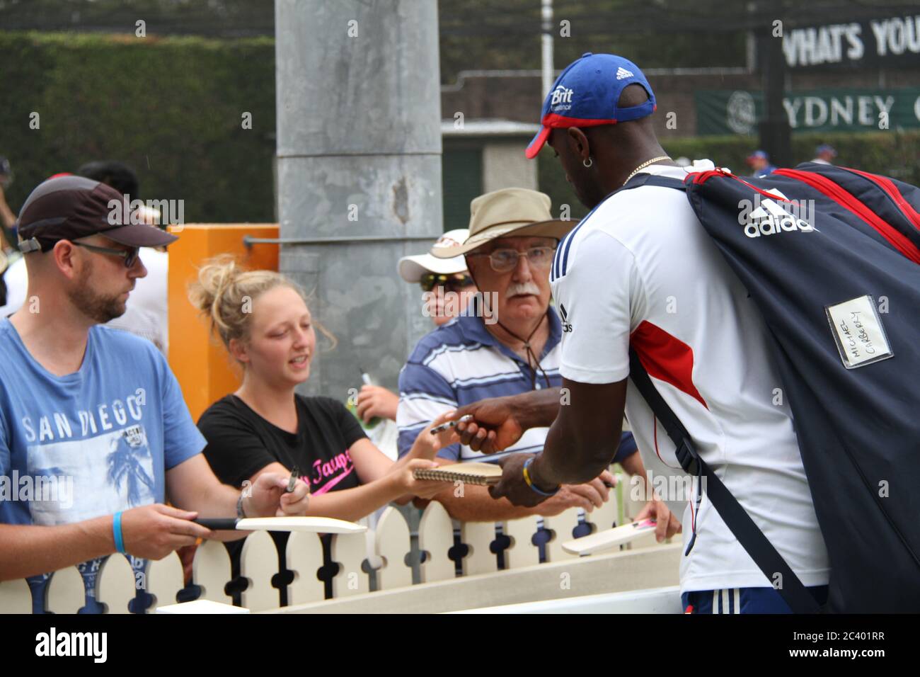 English cricketer Michael Carberry signs autographs and has his photo ...