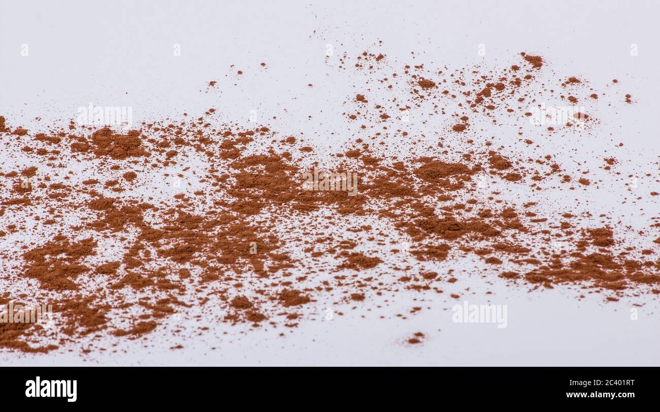 Chocolate Powder isolated on white background. Macro Stock Photo - Alamy