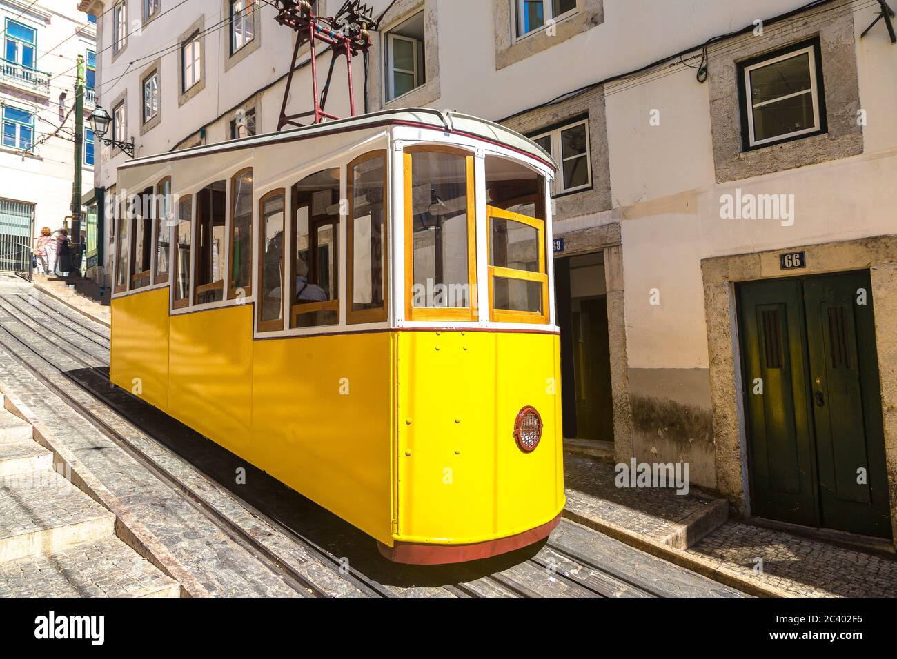 The Gloria Funicular in the city center of Lisbon in a beautiful summer day, Portugal Stock ...