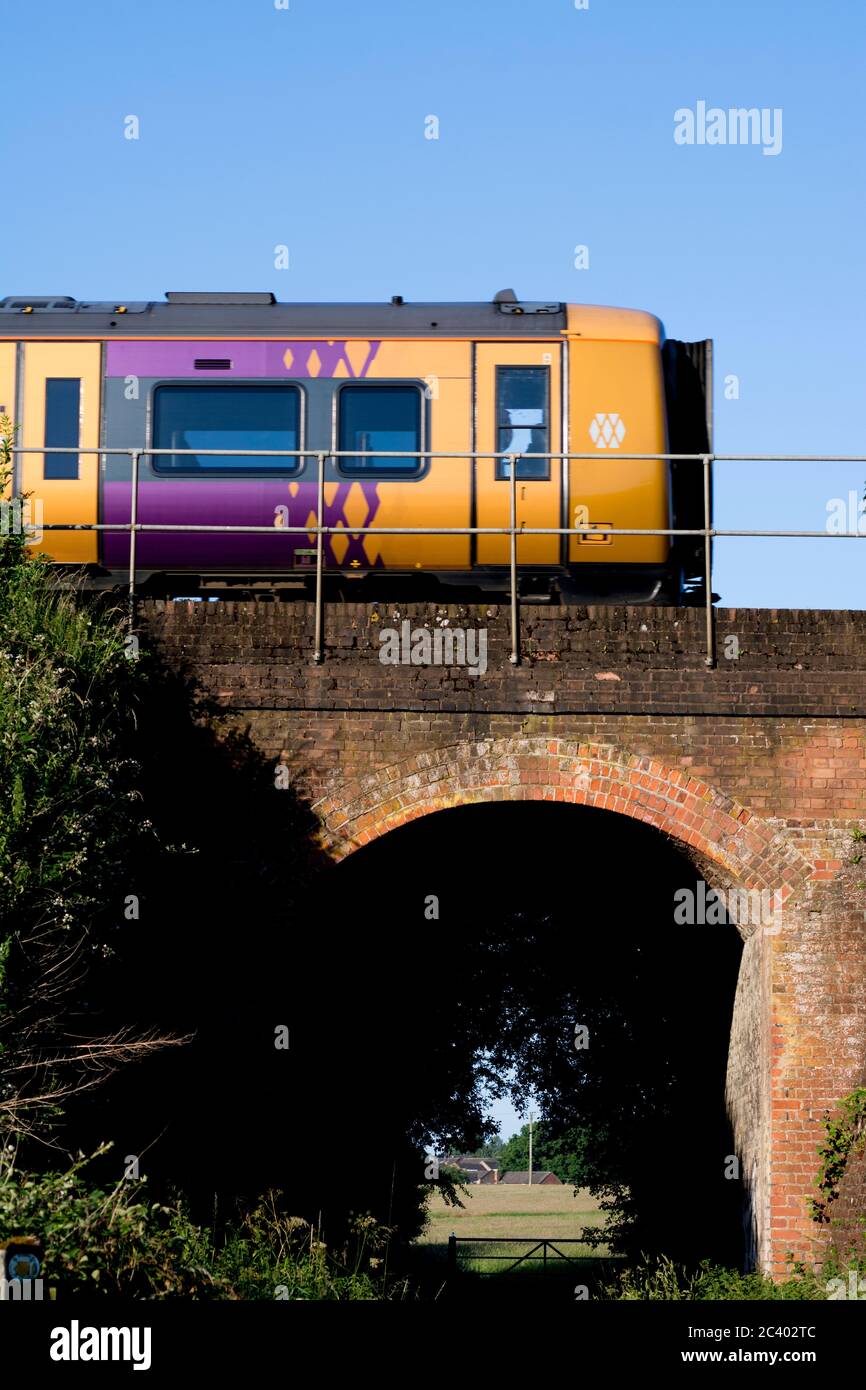 West Midlands Railway class 172 diesel multiple unit train crossing a ...