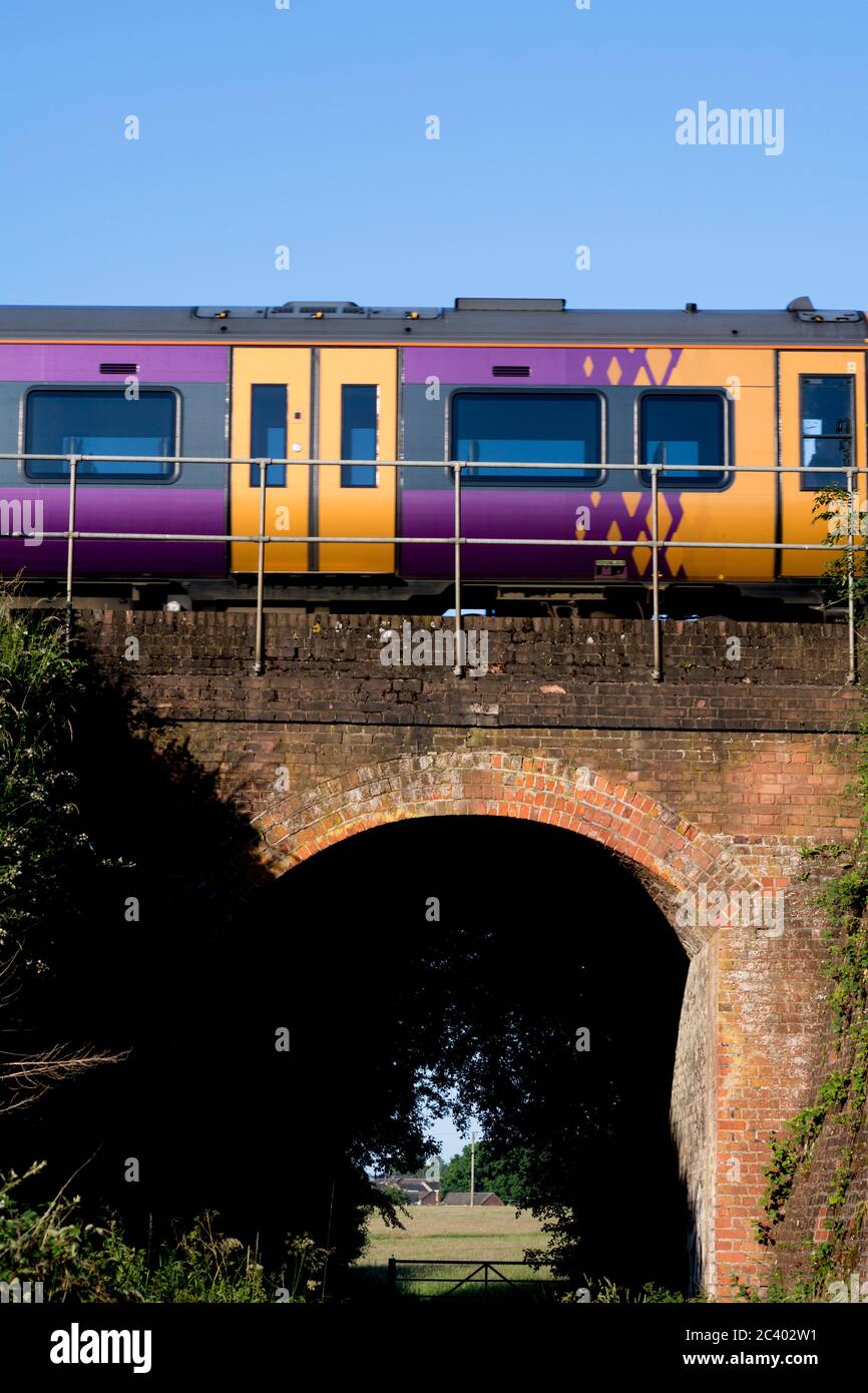 West Midlands Railway class 172 diesel multiple unit train crossing a ...