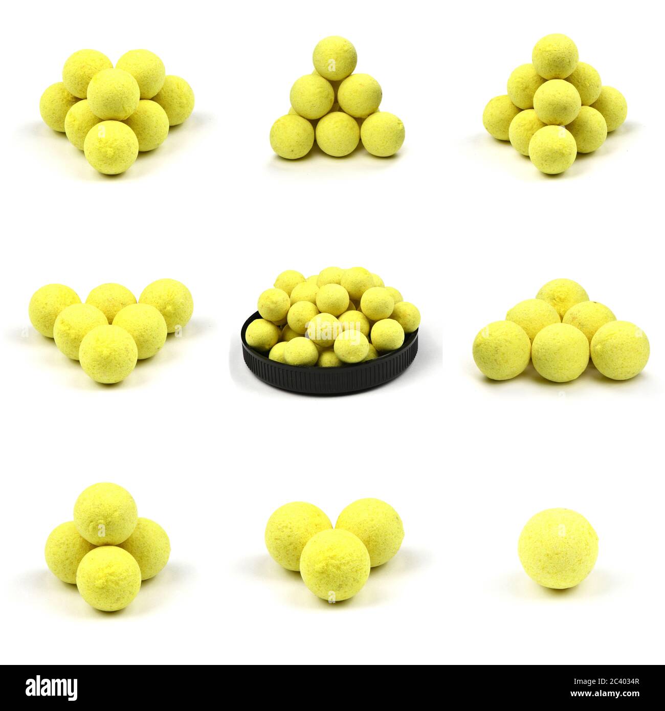 Nine Close up view of yellow boilies, fishing baits for carp isolated ...