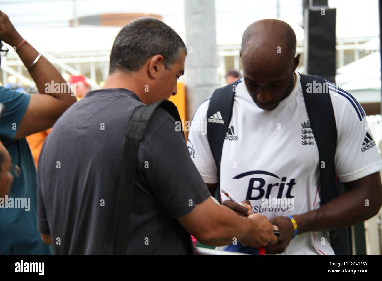 English cricketer Michael Carberry signs autographs and has his photo ...