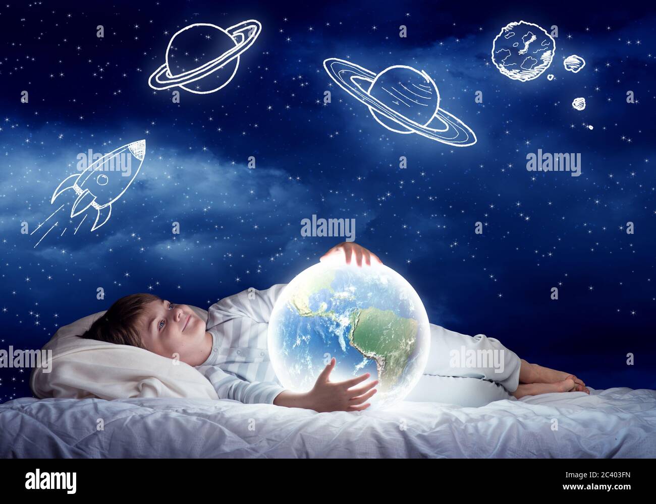 Boy dreaming before sleep Stock Photo - Alamy