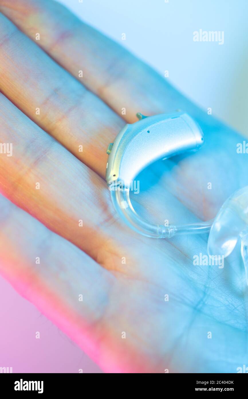 Modern digital hearing aid for deafness and deaf people Stock Photo - Alamy