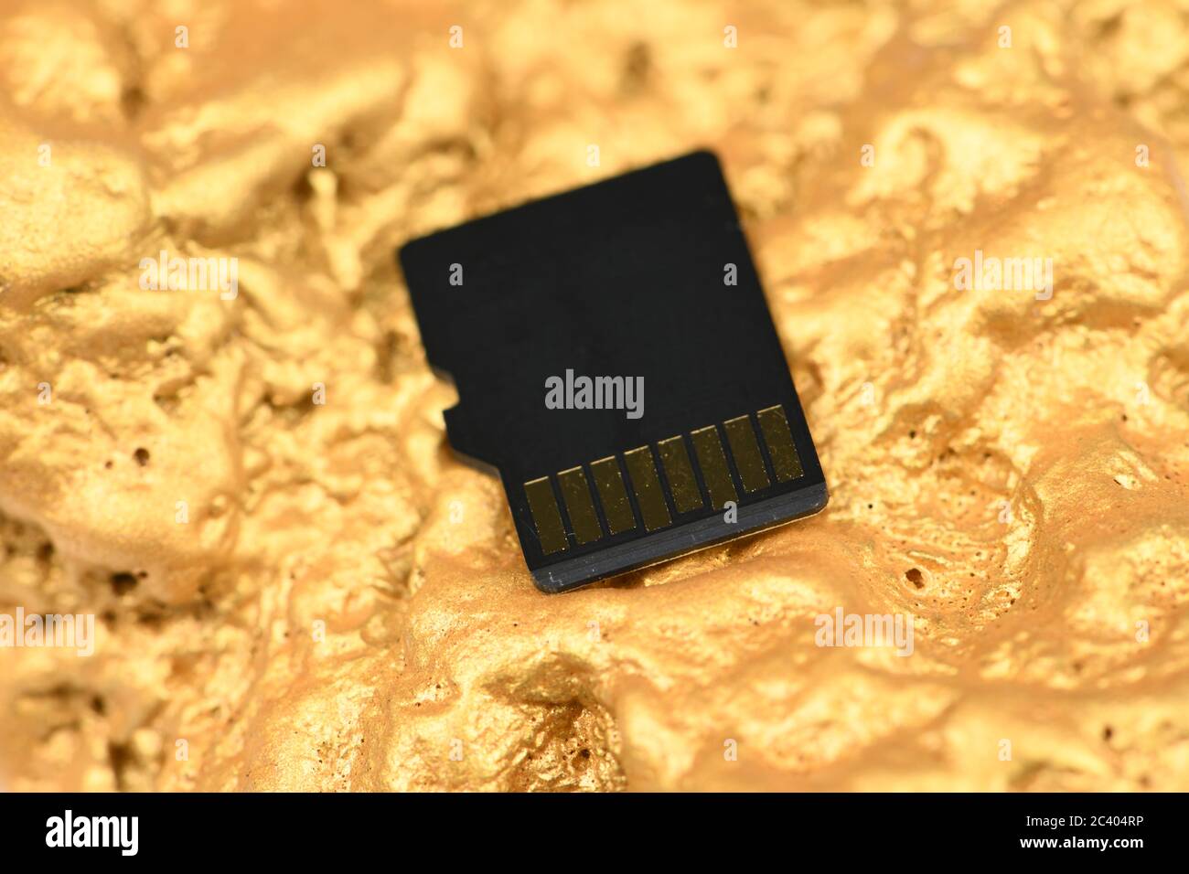 SD memory card isolated on gold background. Soft-focus Stock Photo - Alamy