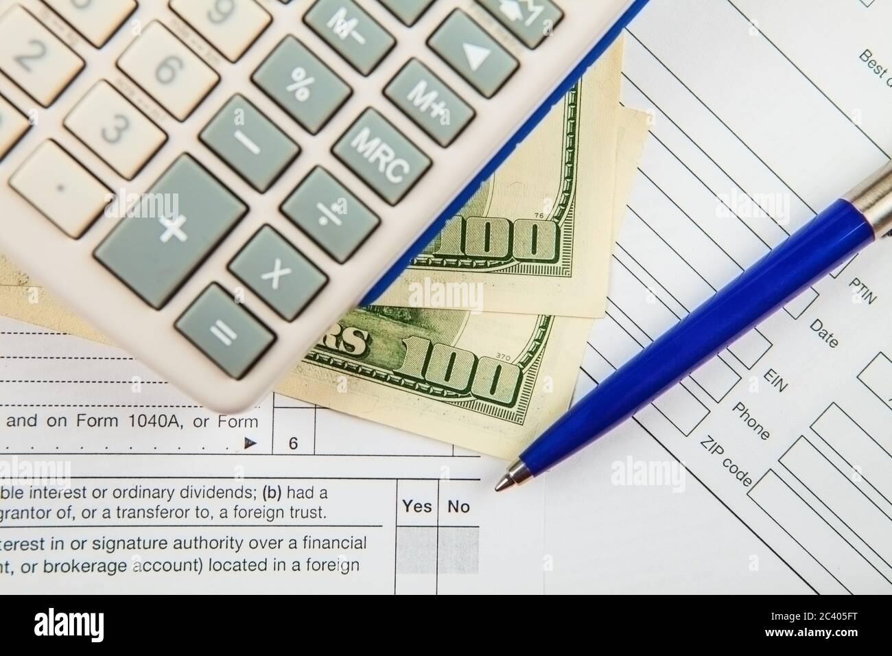 Tax form and calculator hi-res stock photography and images - Alamy