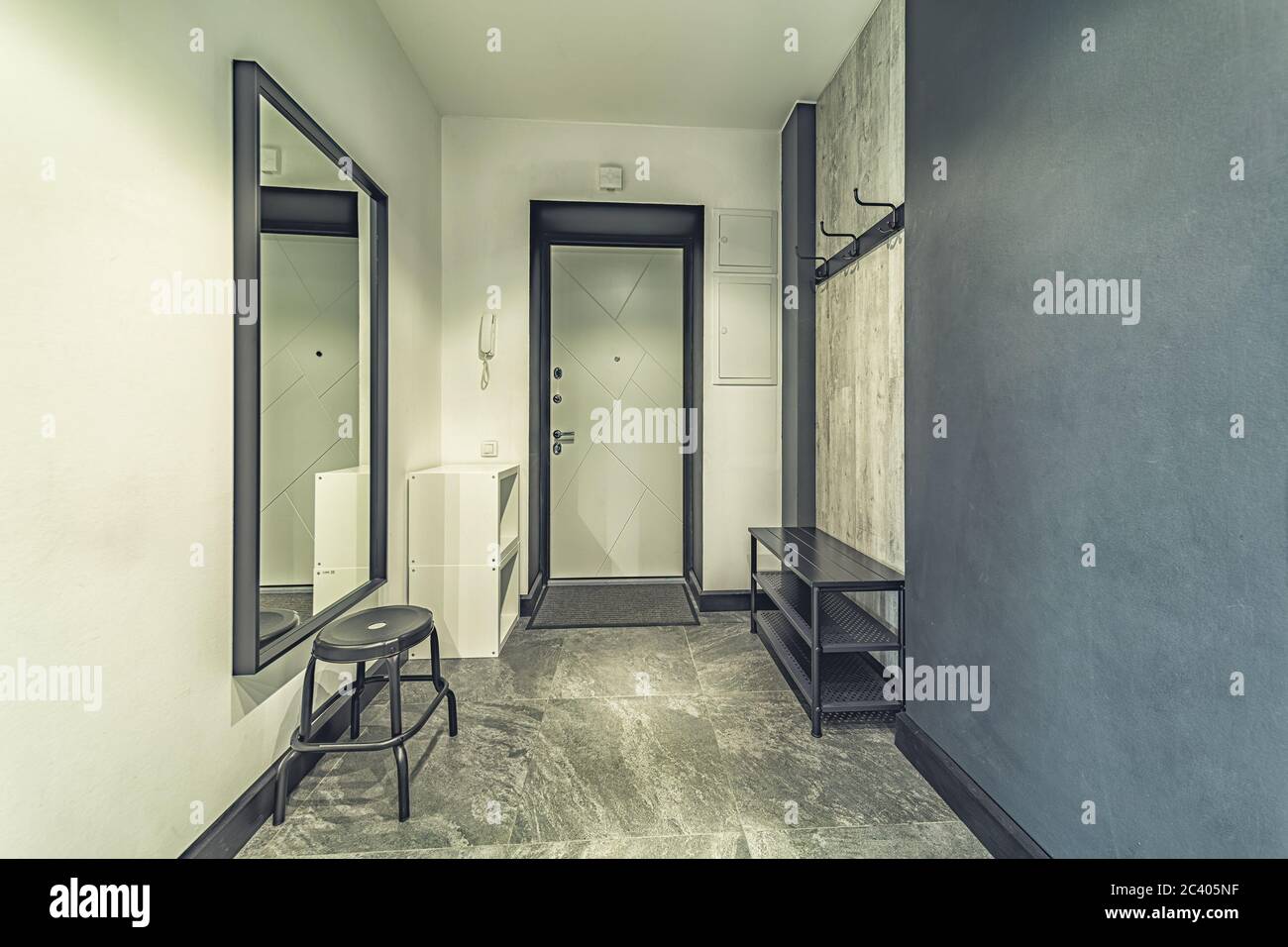 Empty residential house entrance with closed wooden doors tiny hallway ...