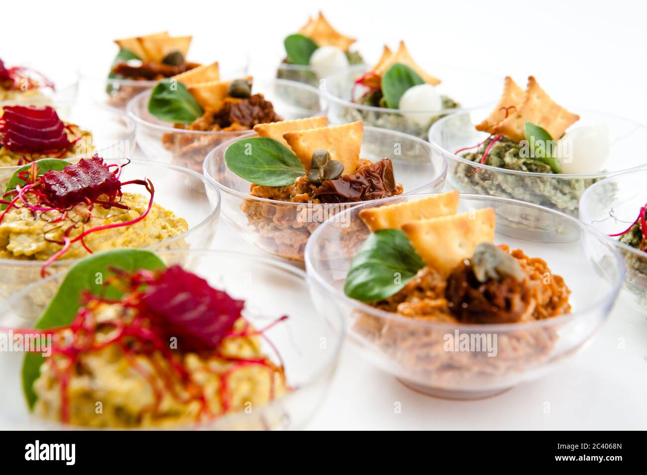 Conference snacks. Dry catering. Small dish snacks on a white ...
