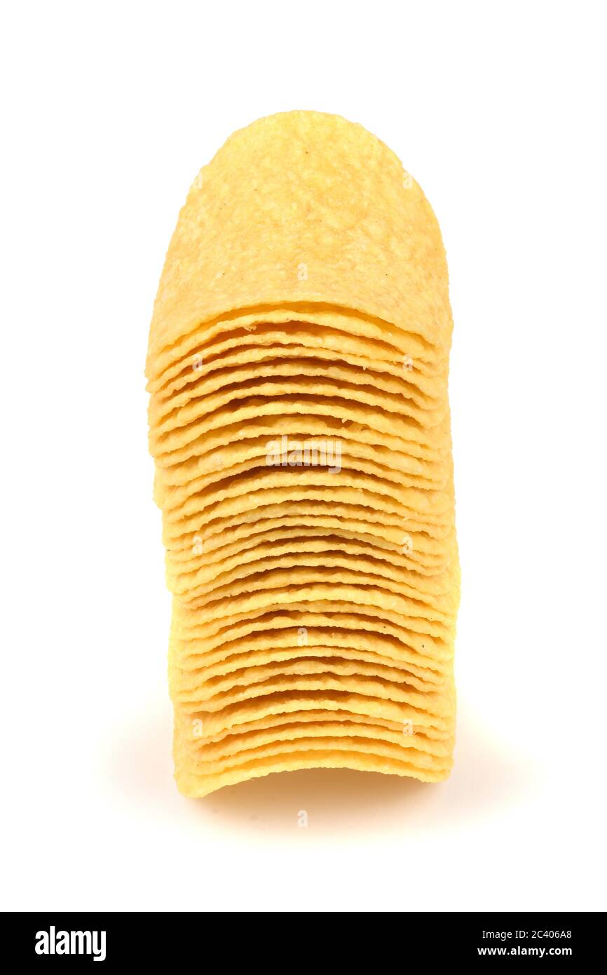 Tasty crispy potato chips stacked isolated on white background. High ...