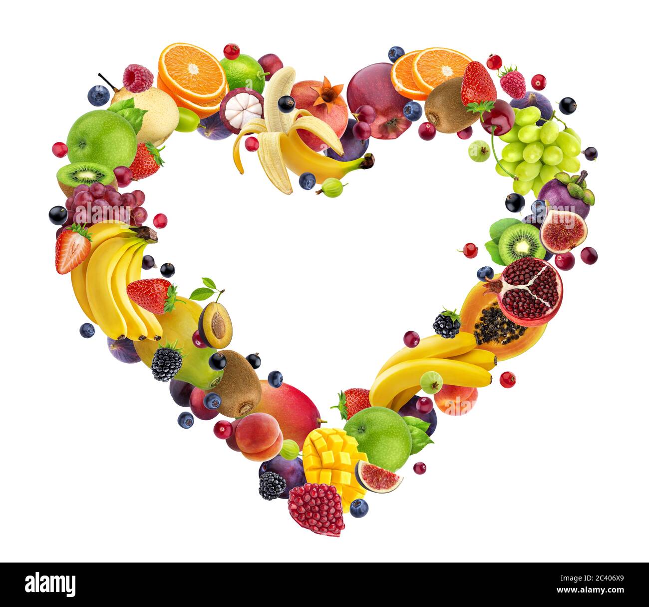 Heart made of different fruits and berries isolated on white background ...