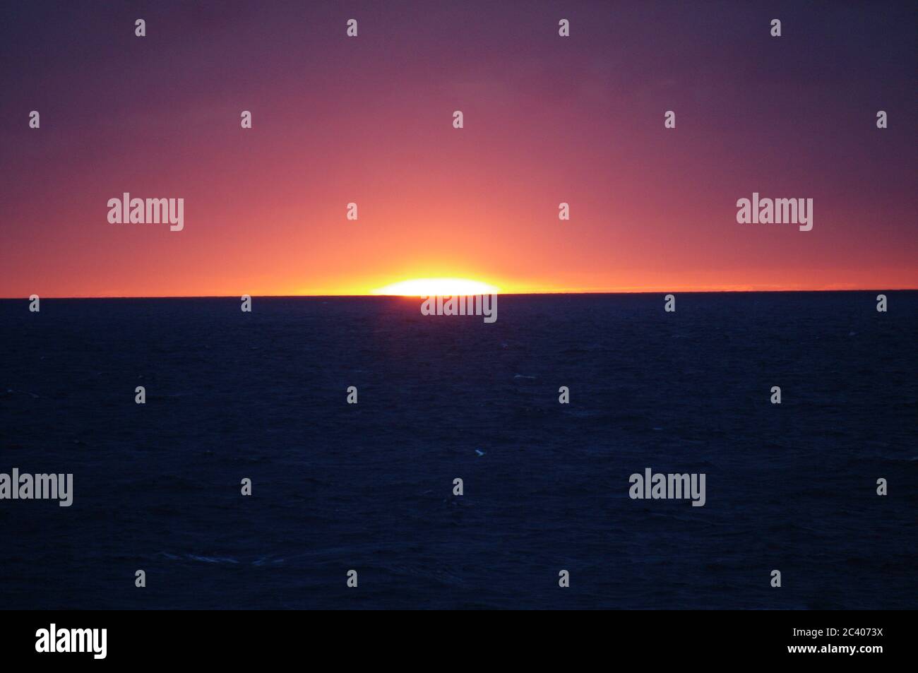 Sequence of images of a sunset from the same viewpoint, Sun setting ...