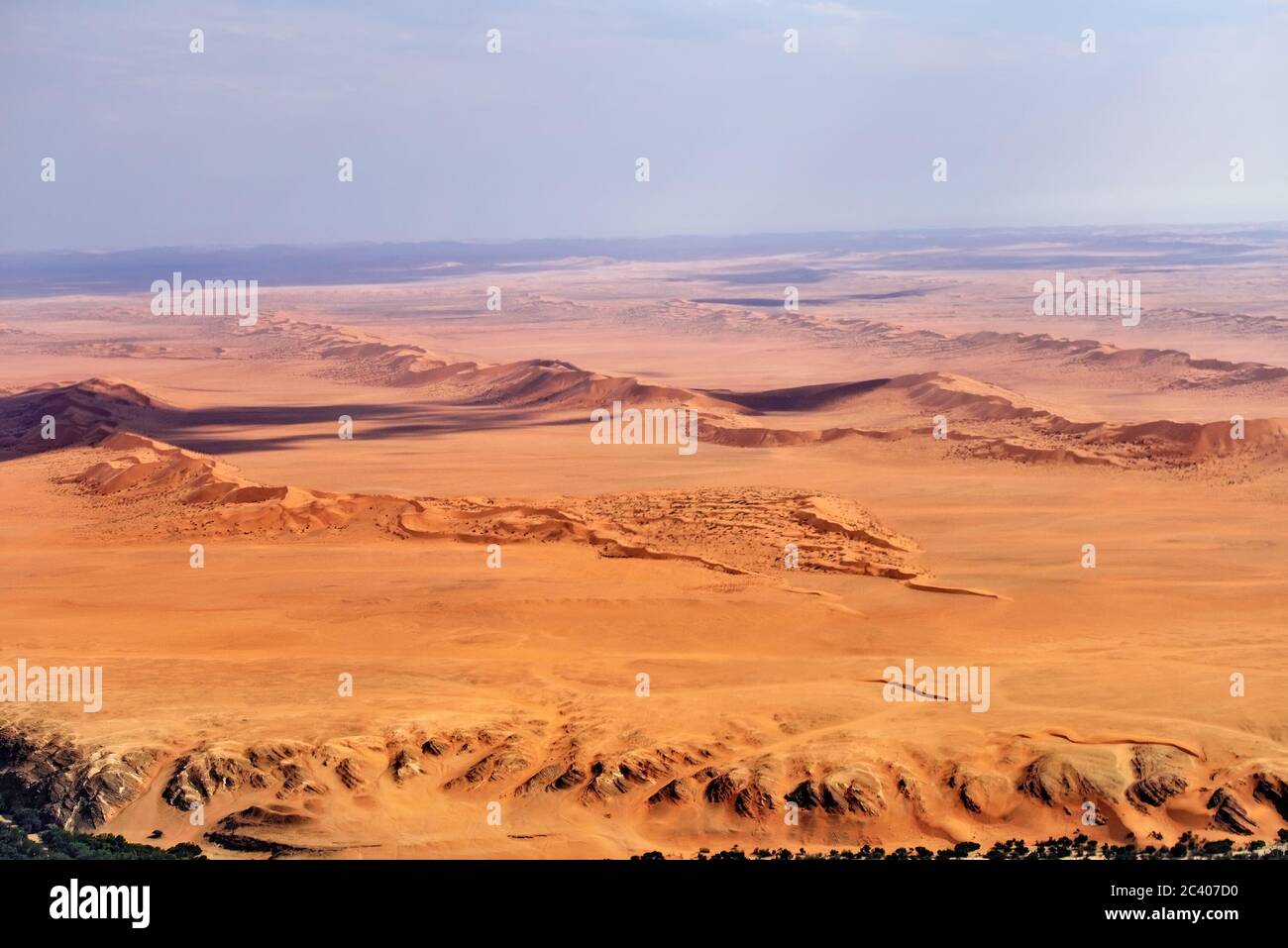 Aerial view of high red dunes, located in the Namib Desert, Namibia ...