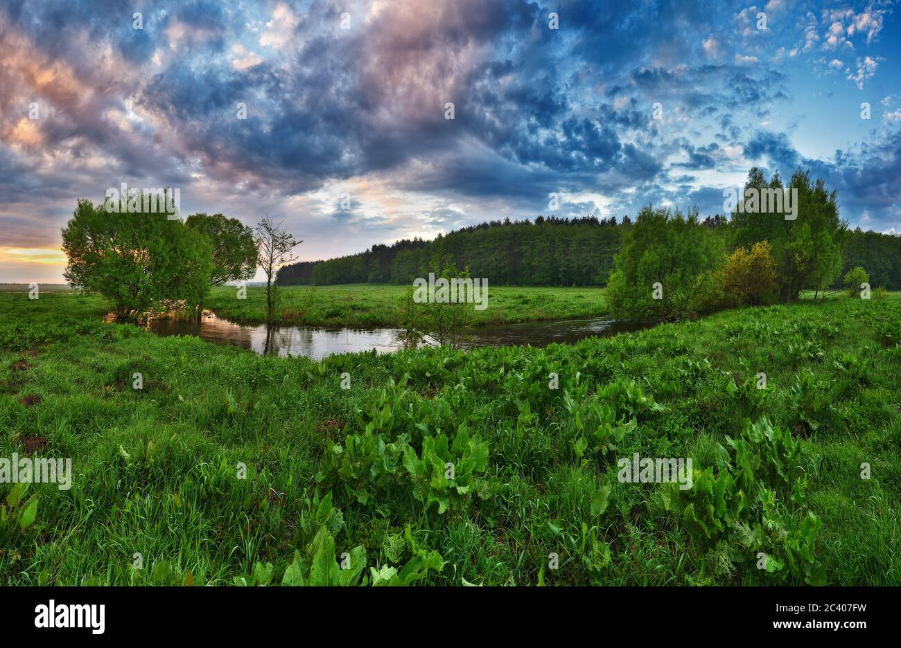 Beautiful spring sunrise over river banks Stock Photo - Alamy