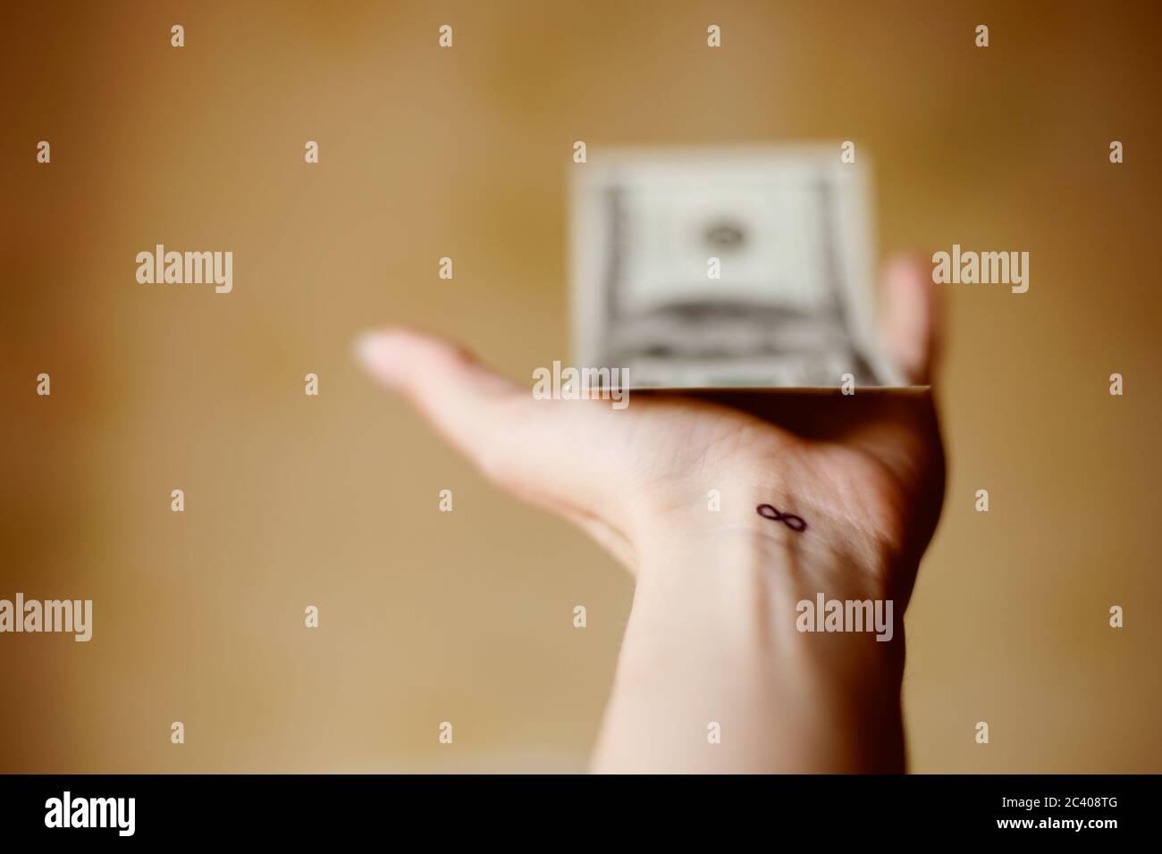 The number eight is applied on the wrist to attract money. Dollar bill ...