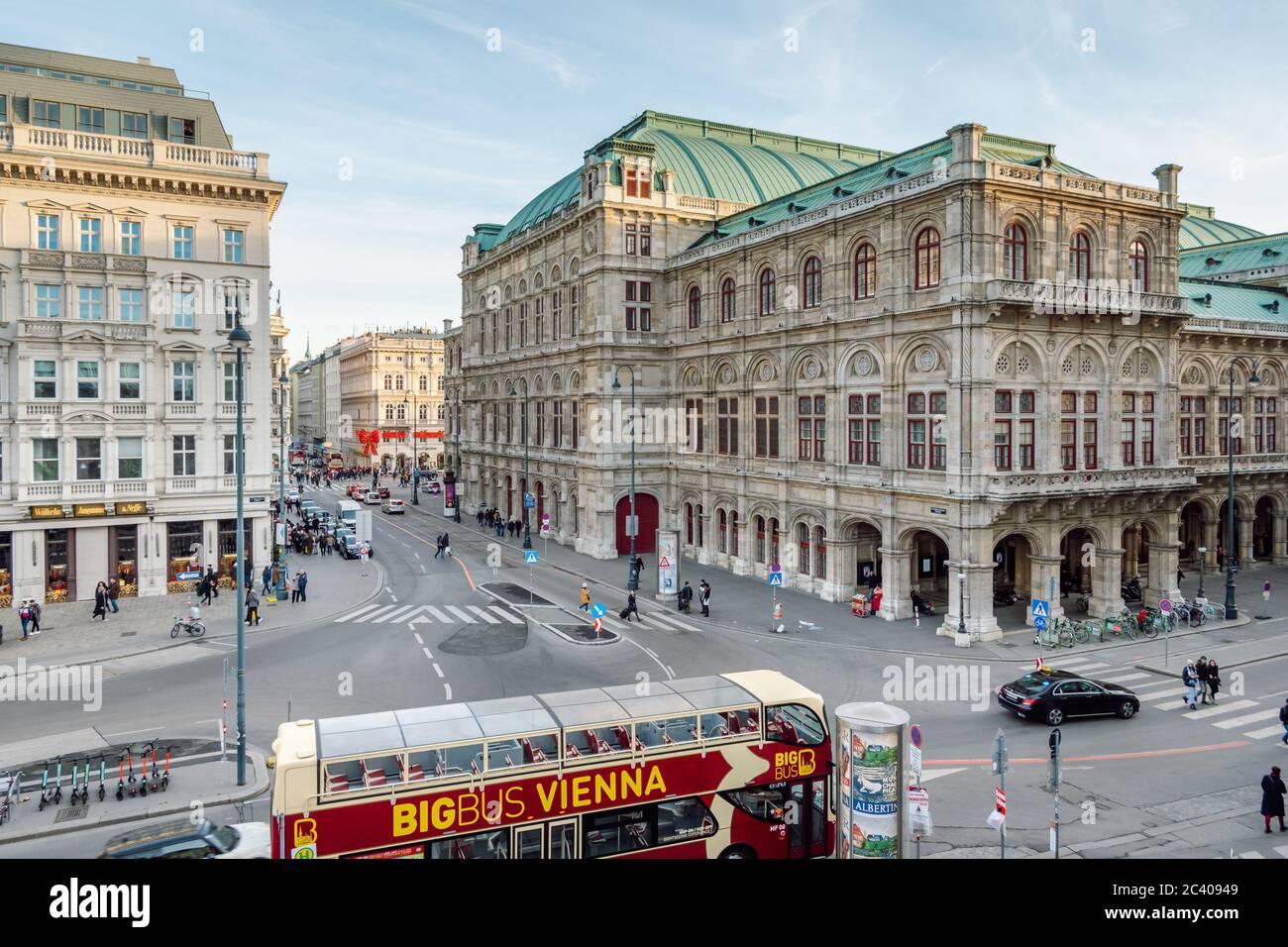 Tourist, sightseeing, red bus parked by Albertinaplatz, busy street in ...