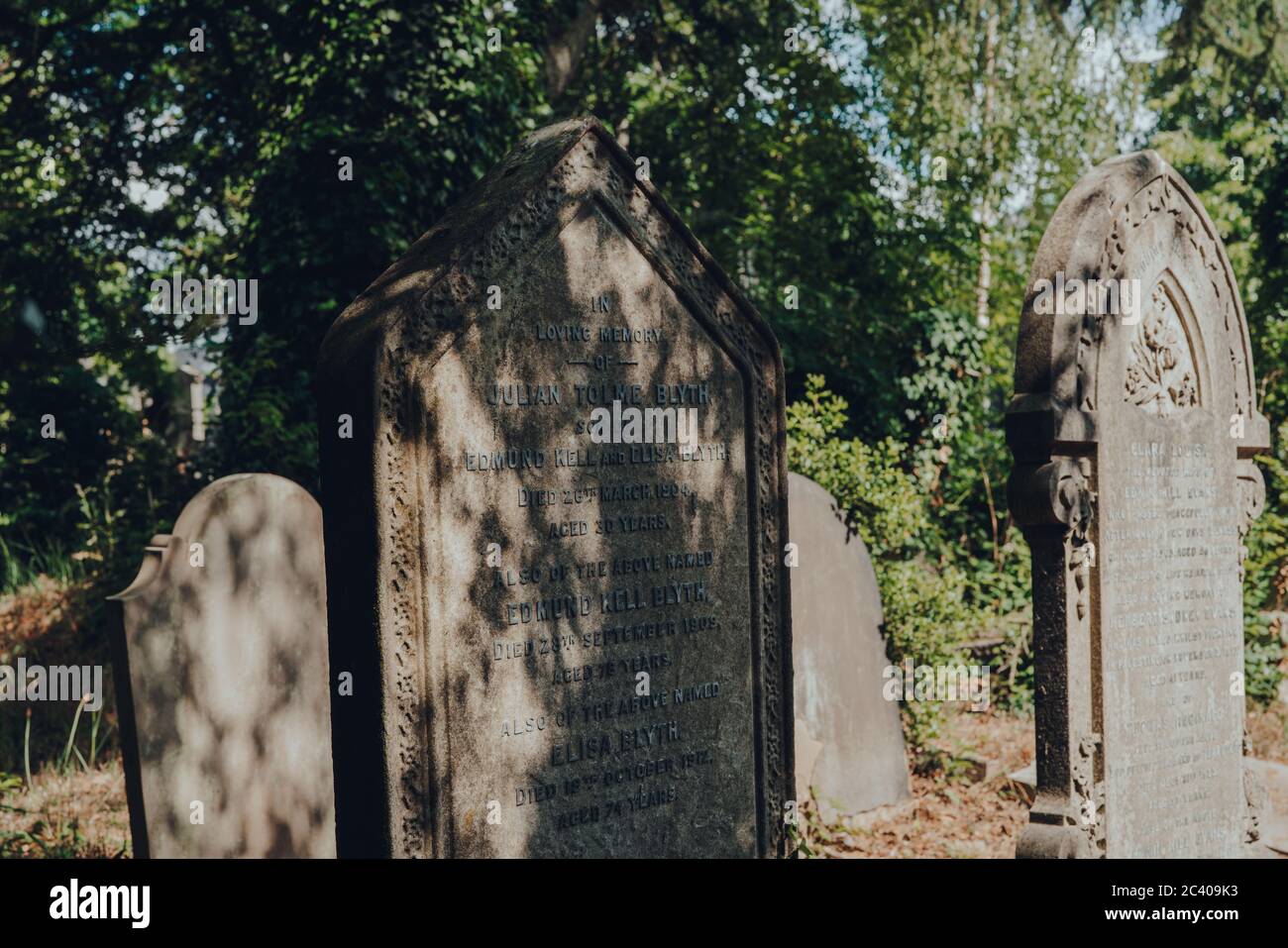 London, UK - June 16, 2020: Light and shadow on tombstones inside ...