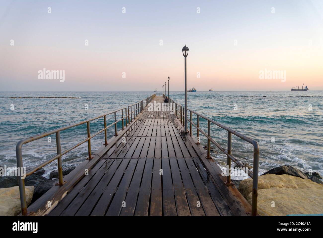 Wooden pier in Limassol overlooking the sea. The concept of travel and ...