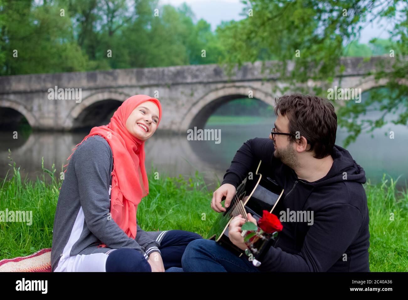 Muslim couple enjoying the day in the nature Stock Photo - Alamy