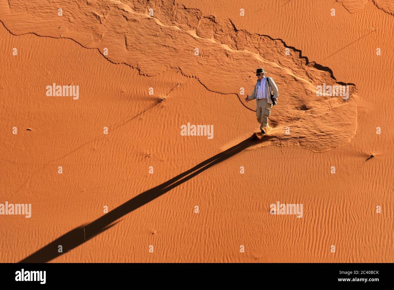 SOSSUSVLEI, NAMIBIA - JAN 29, 2016: Unidentified man descends from the ...
