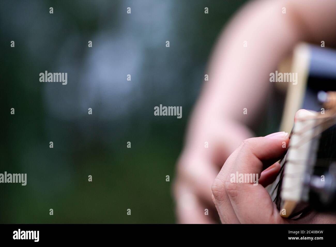 Guitar string woman hand outdoor hi-res stock photography and images ...
