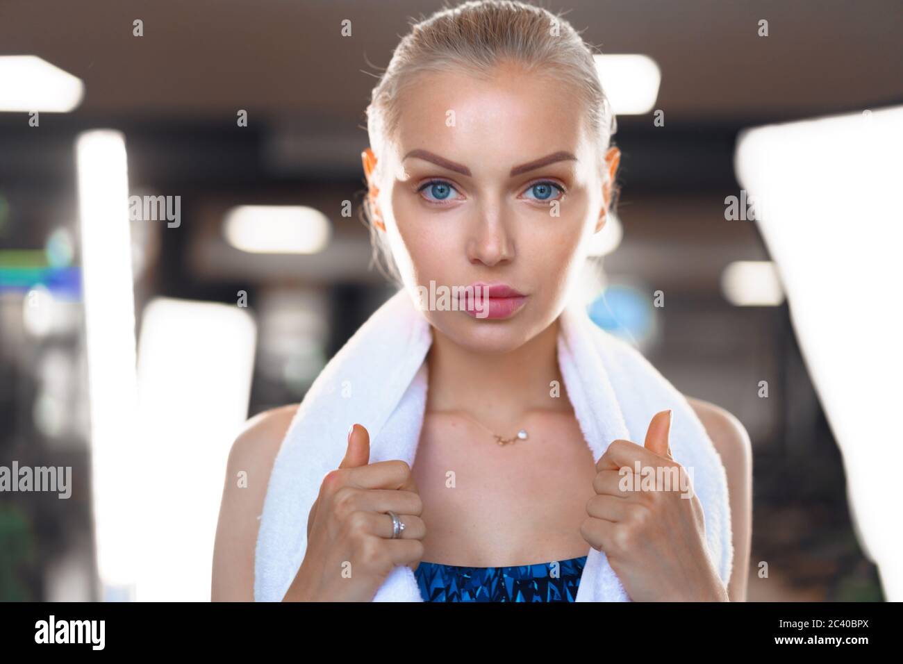 Strong and determined woman in sportswear standing in the gym Stock ...