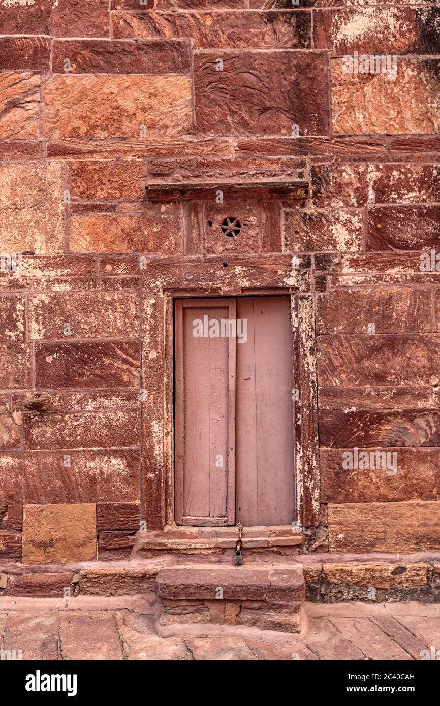 Red door at Jodhpur fort near main gate entrance, India Stock Photo - Alamy