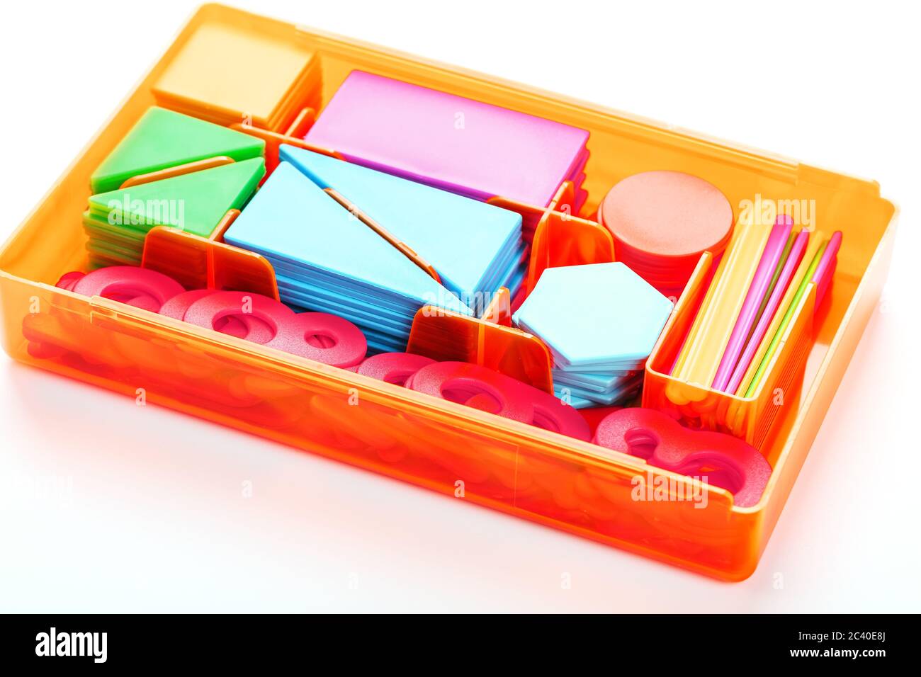 Colorful figures and numbers for children in a box. A tool for ...
