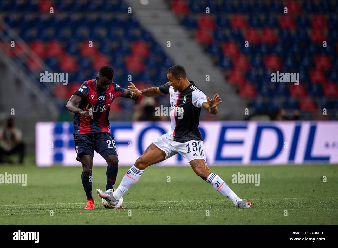 Danilo Luiz da Silva (Juventus) Musa Juwara (Bologna) during the ...