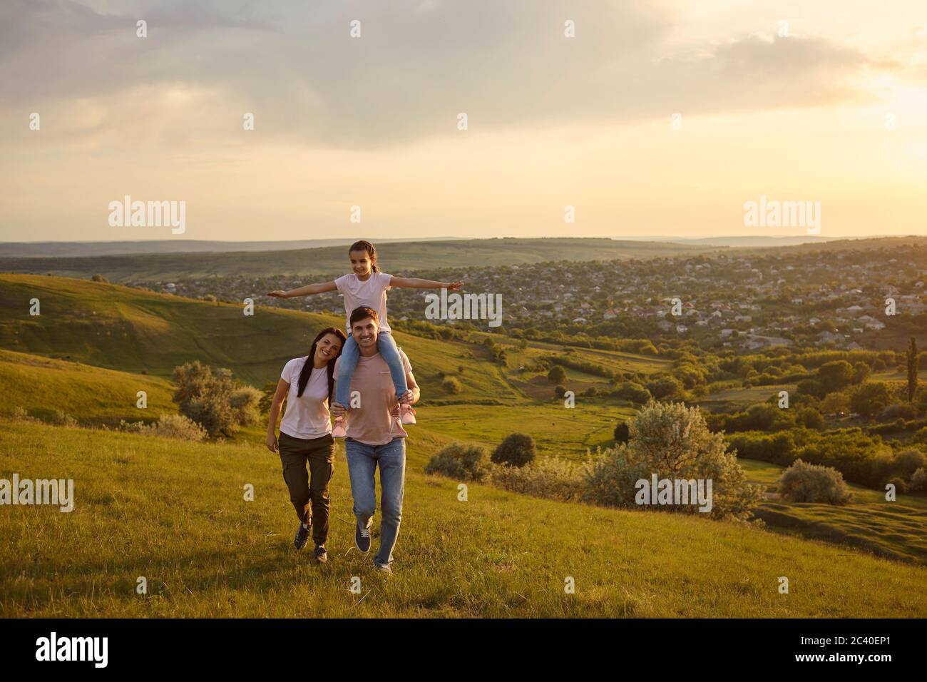 Loving family with child enjoying their summer vacation in mountains ... Loving family with child enjoying their summer vacation in mountains ...