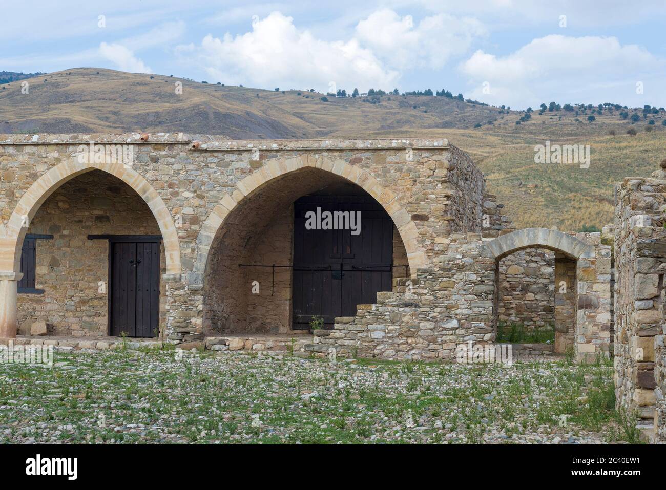Destroyed stone walls of the temple in Cyprus. The concept of travel ...
