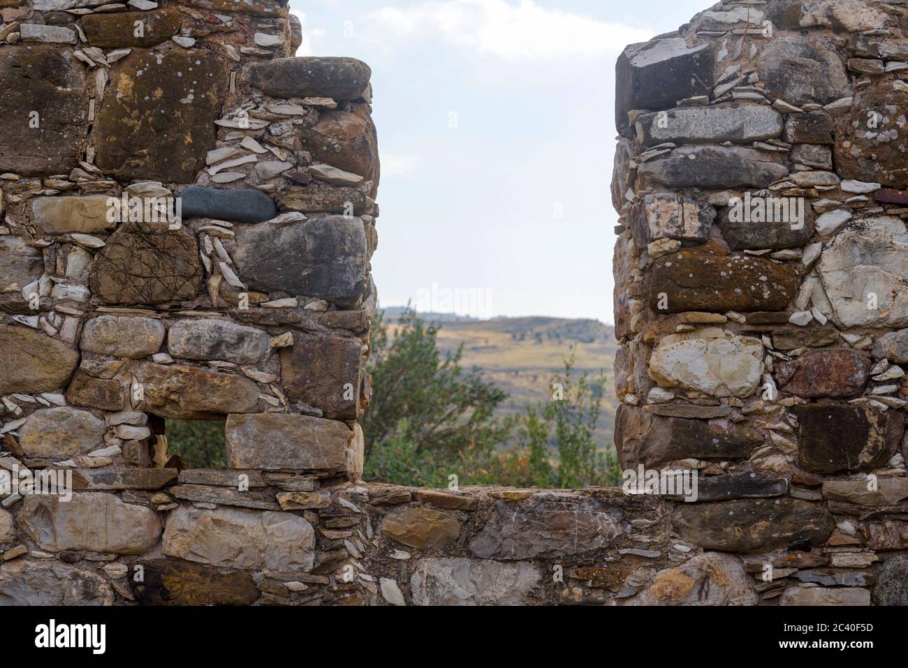 Destroyed stone walls of the temple in Cyprus. The concept of travel ...