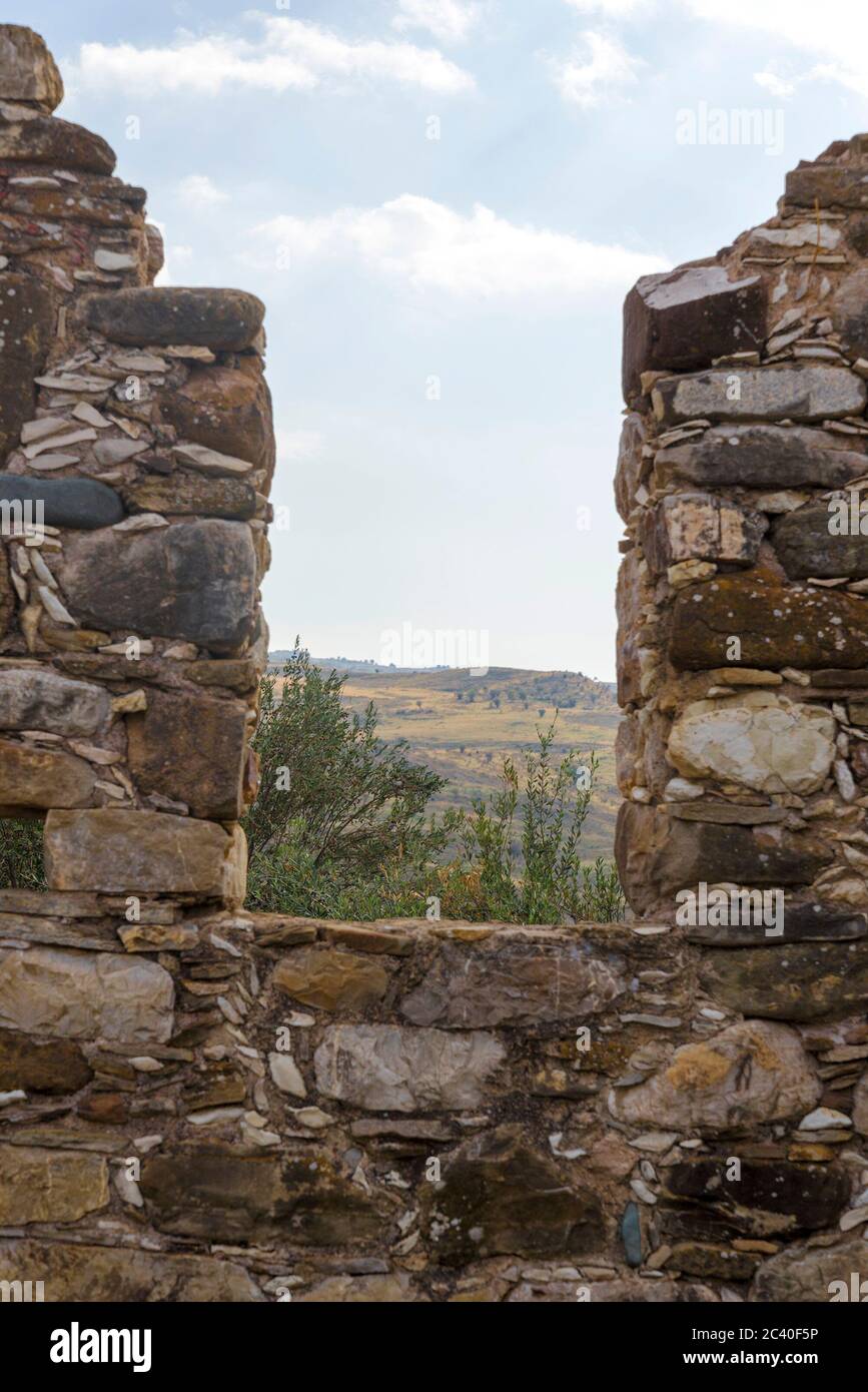 Destroyed stone walls of the temple in Cyprus. The concept of travel ...