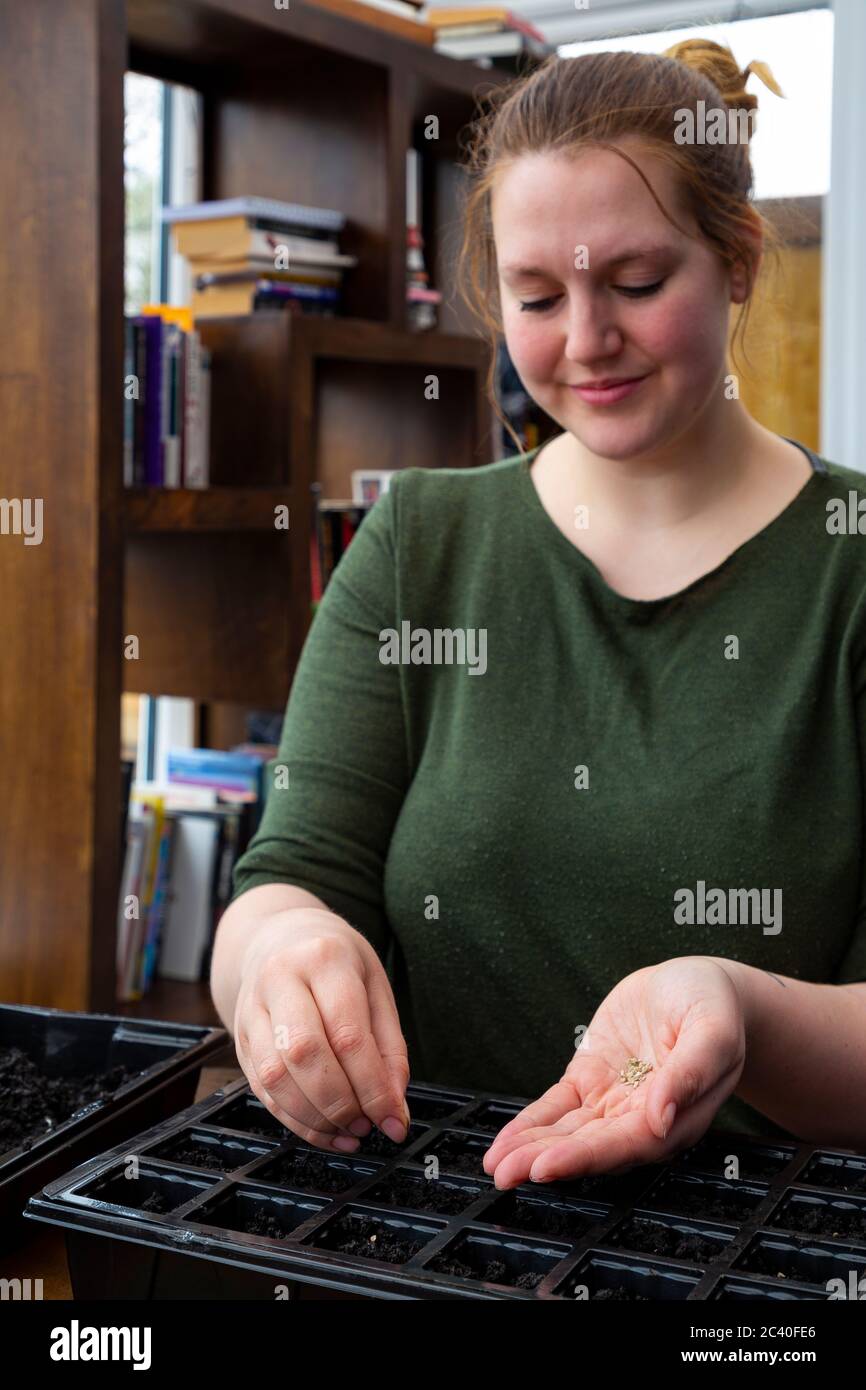 Woman sowing seed hi-res stock photography and images - Alamy