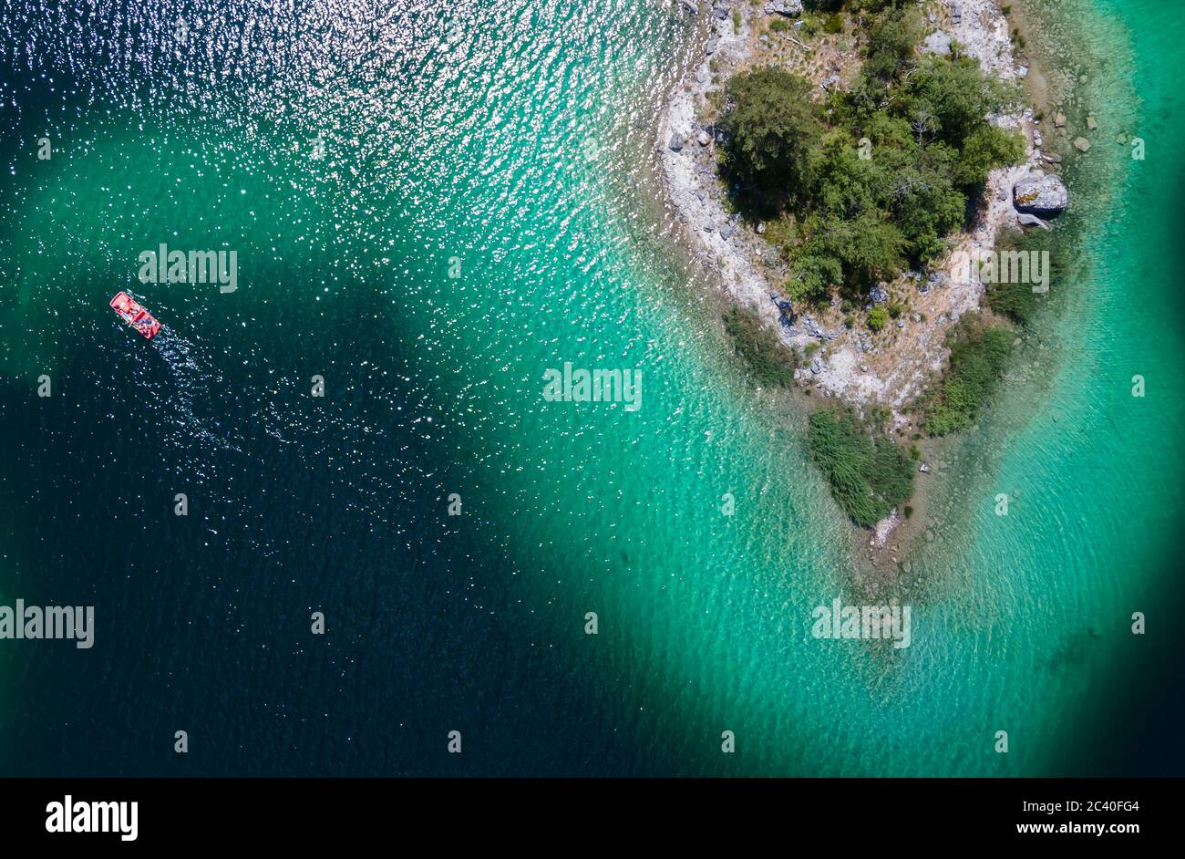 23 June 2020, Bavaria, Grainau: Excursionists take a pedal boat over ...