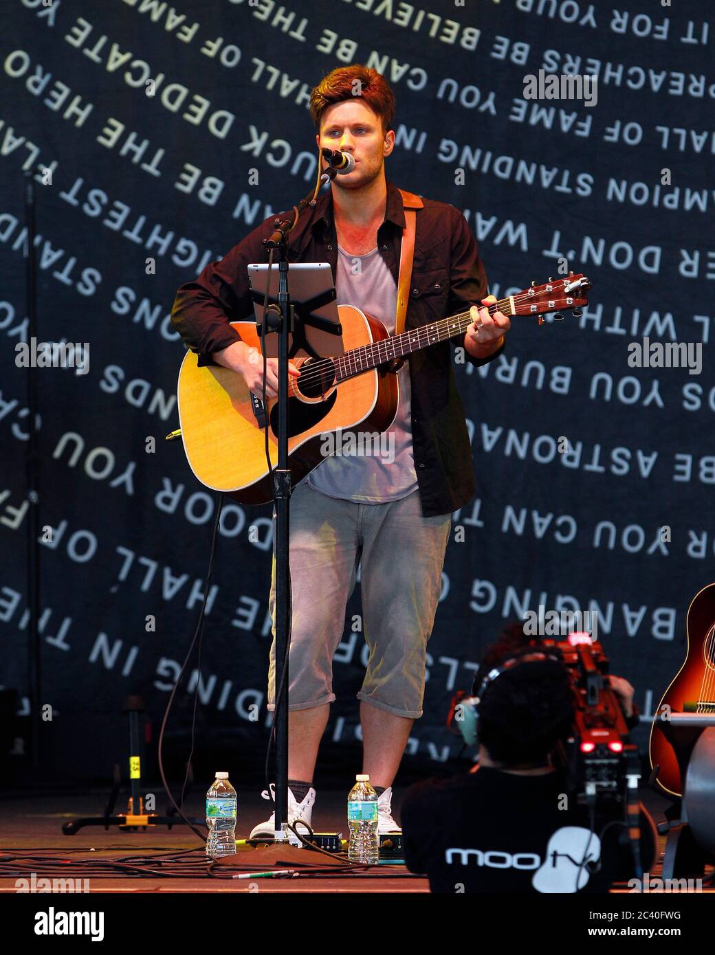 Singer/songwriter Jamie Scott performs at the Cruzan Amphitheater in ...