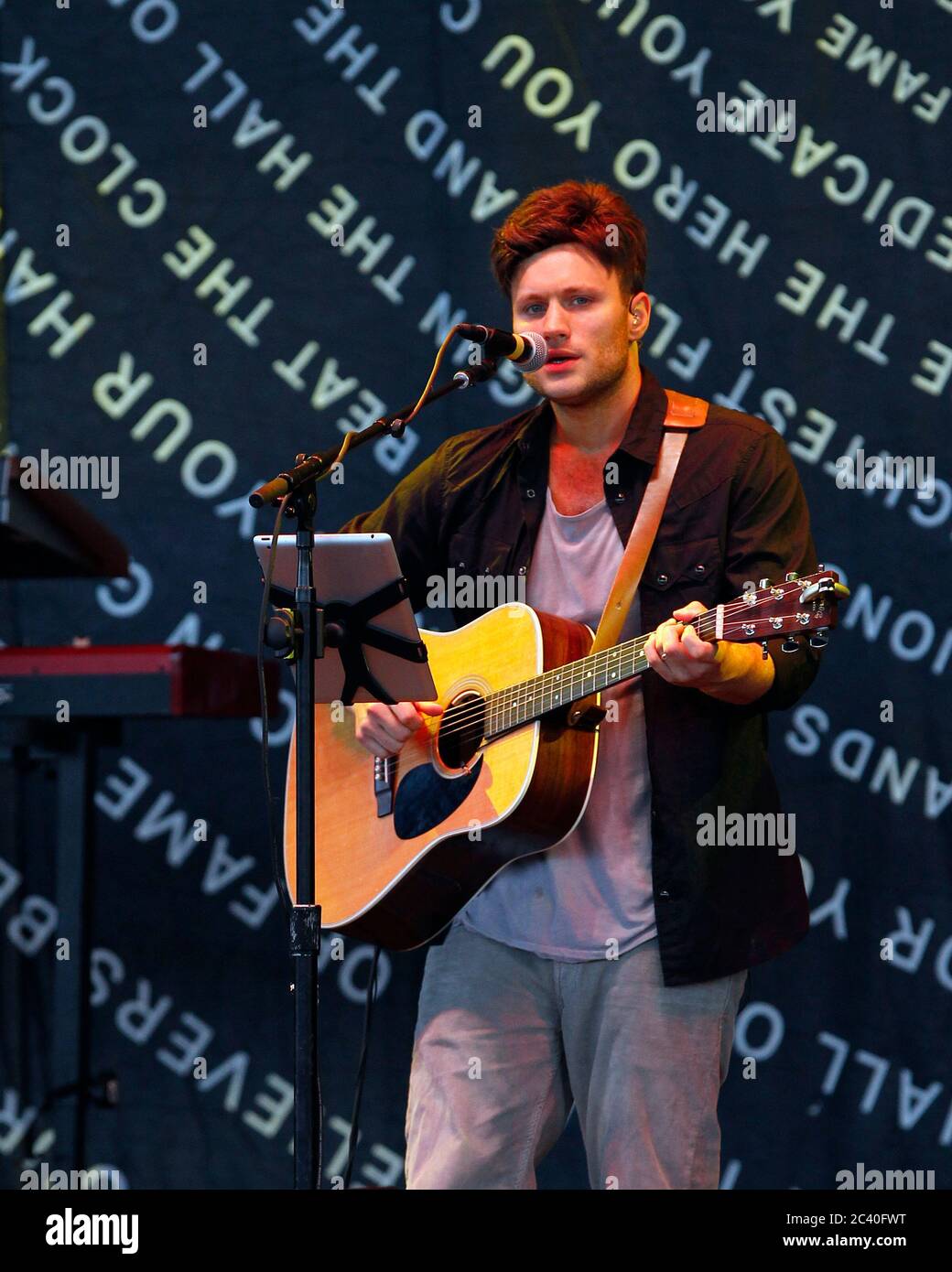 Singer/songwriter Jamie Scott performs at the Cruzan Amphitheater in ...