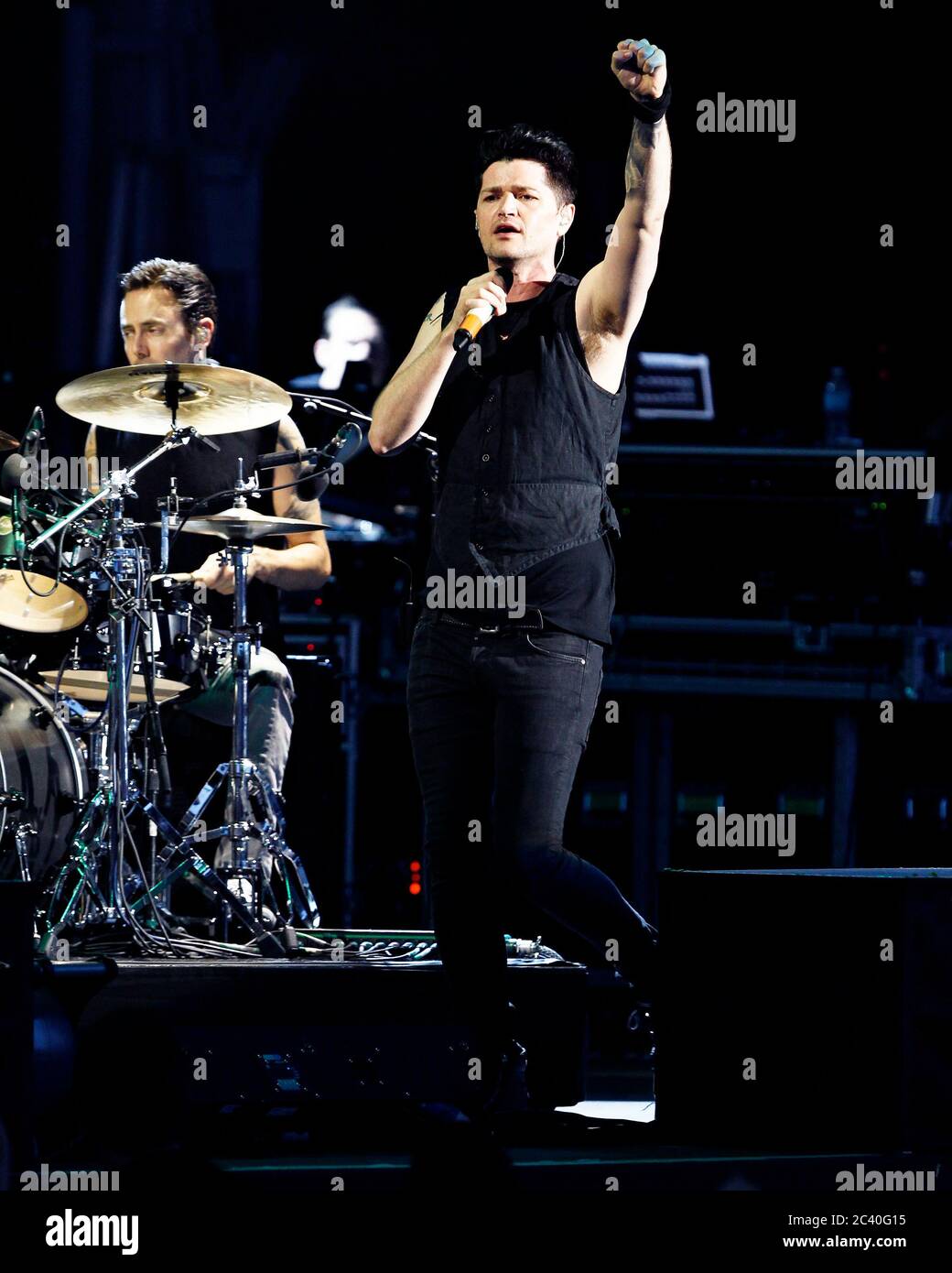 Danny O'Donoghue, lead vocalist of The Script, performs with the rest ...