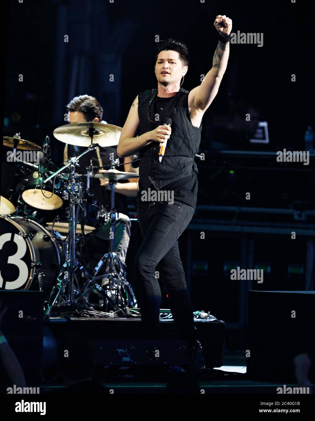 Danny O'Donoghue, lead vocalist of The Script, performs with the rest ...