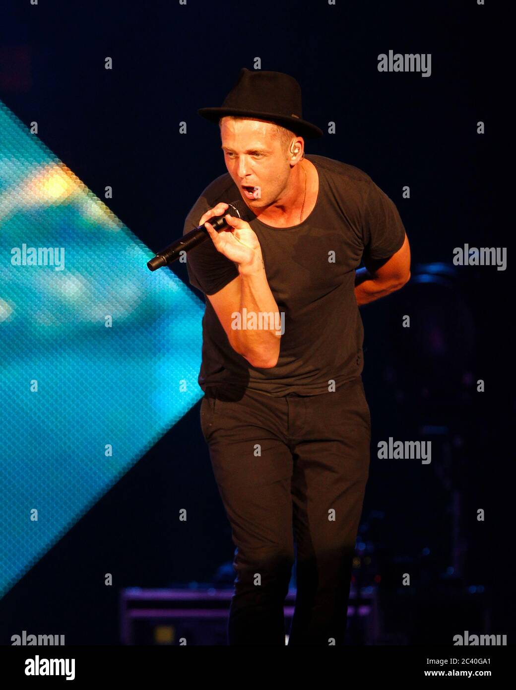 OneRepublic frontman Ryan Tedder performs with the rest of the band at ...