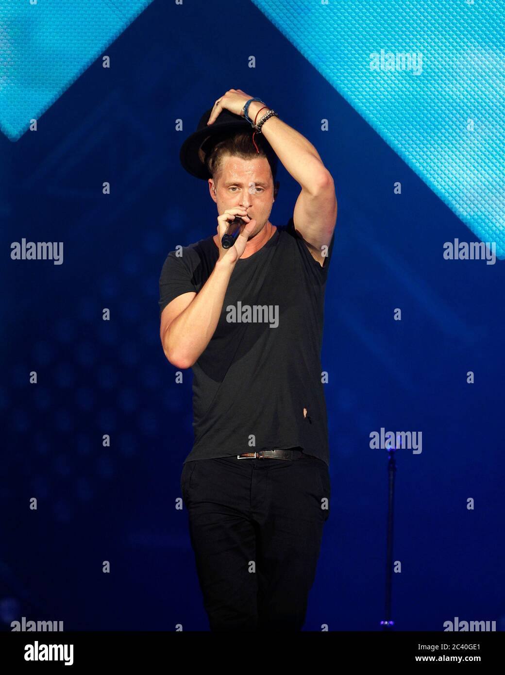 OneRepublic frontman Ryan Tedder performs with the rest of the band at Cruzan Amphitheater in ...