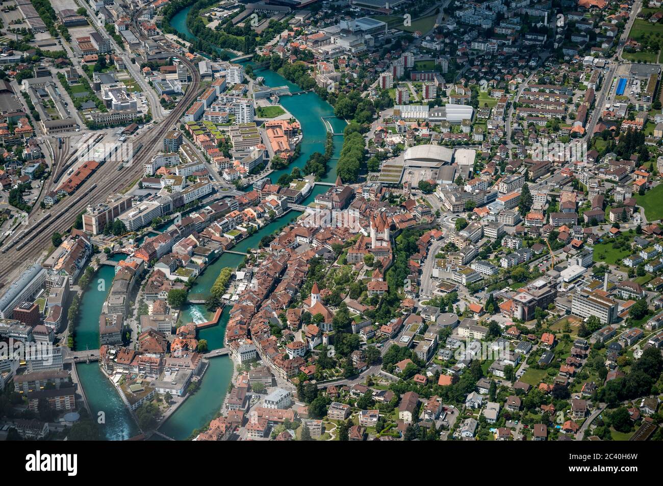 aerial view of the city center of Thun with Schloss Thun, Aare and ...