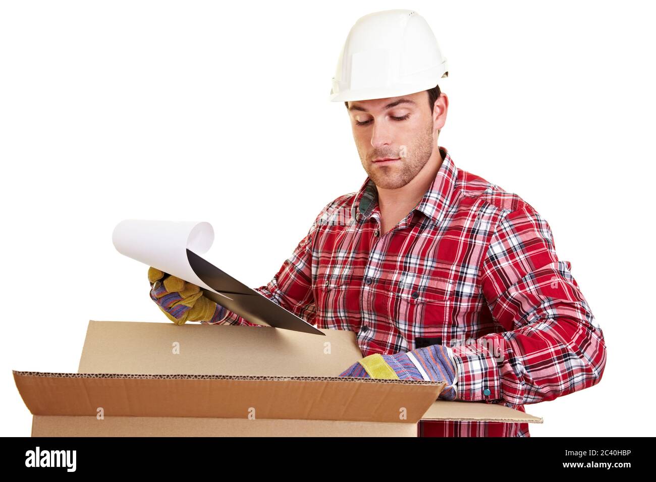 Warehouse worker checks delivery note with checklist on delivery Stock ...