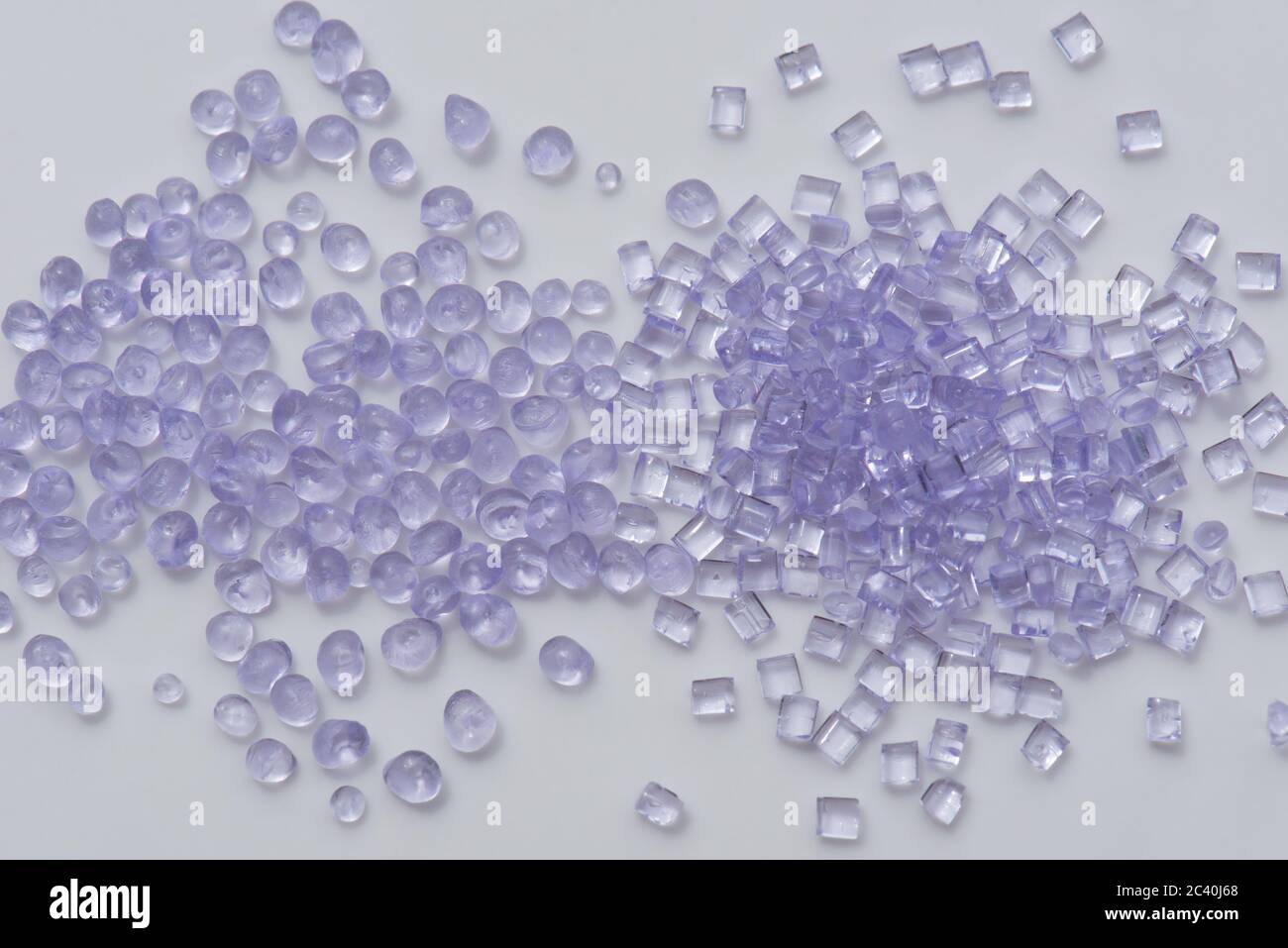 two different kinds of transparent polymer resin granulates Stock Photo ...