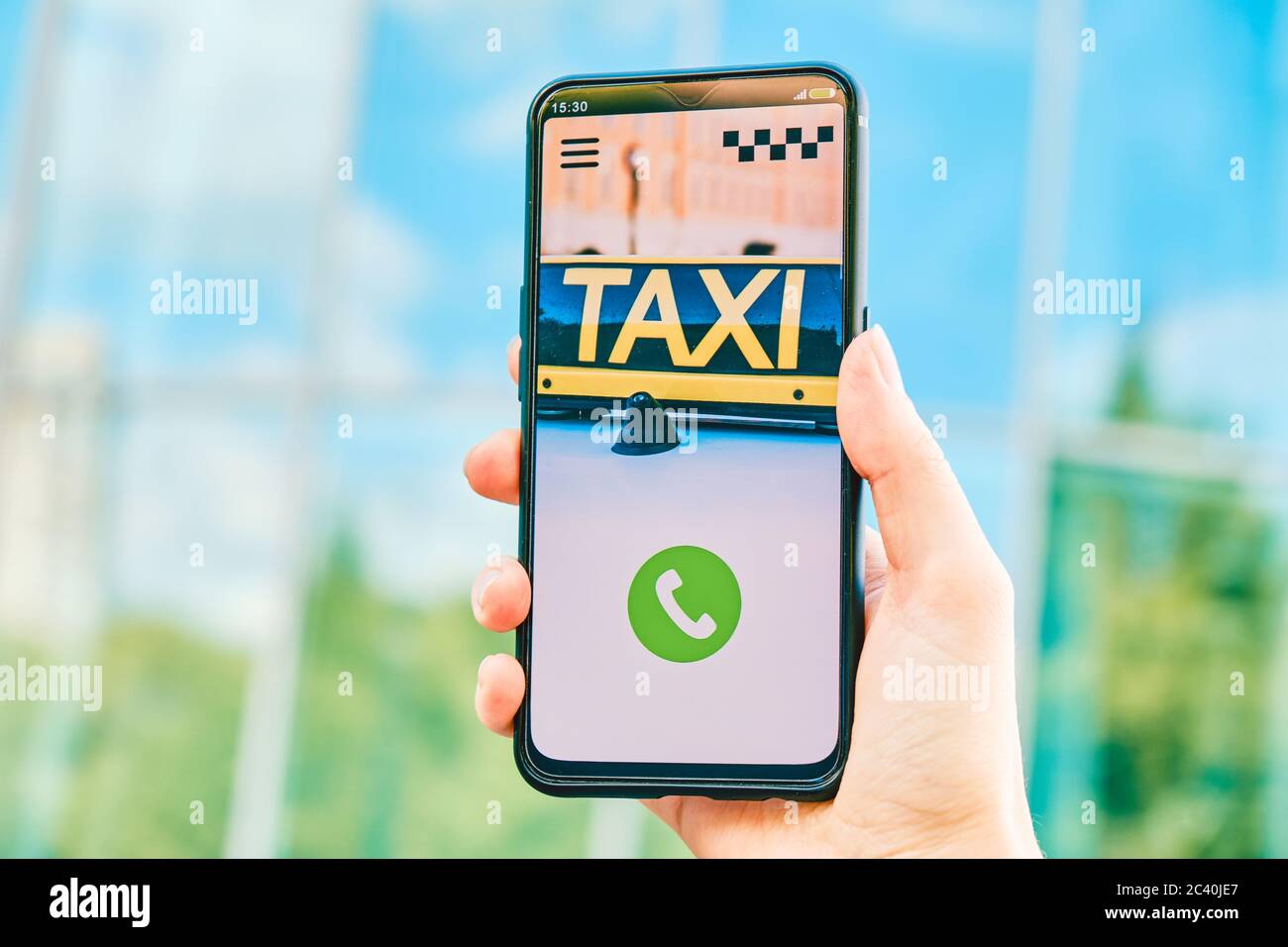 Smartphone with taxi app for ringing and calling Stock Photo - Alamy